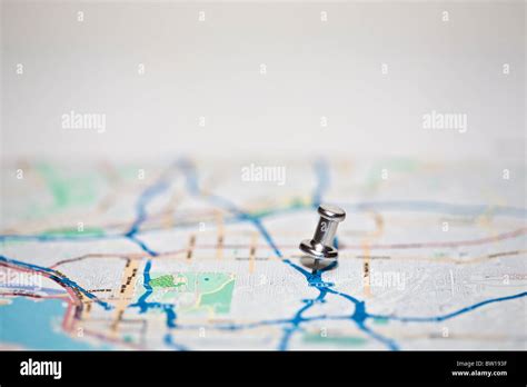 Push Pin In Colorful Map Stock Photo Alamy