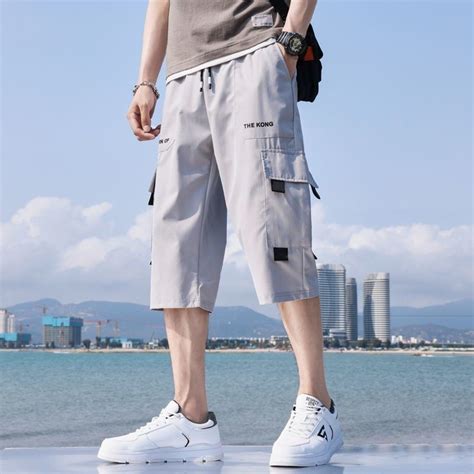 七分褲男7分夏季薄款冰絲外穿新款流行時尚百搭寬松男士短褲短褲男 休閑短褲 運動短褲 五分褲男 7分褲 男生短褲 蝦皮購物