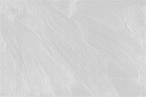 판지 종이 배경에 그려진 흰색 아크릴 질감 프리미엄 사진