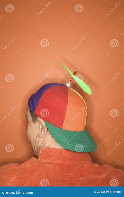 Back View Of Man Wearing Propeller Cap Stock Image Image Of Color
