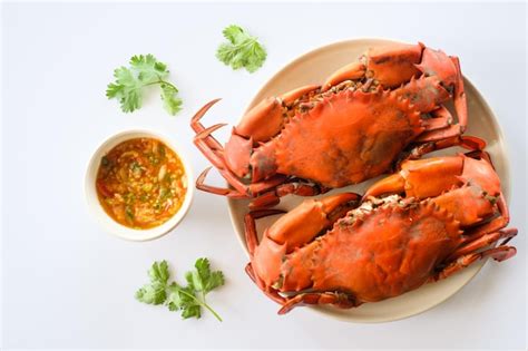 Premium Photo Top View Cooked Giant Sea Crabs On A White Plate With White Table Background