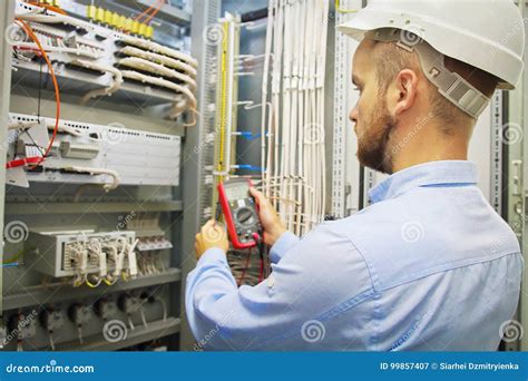 Engineer Electric Measures Multimeter Voltage Of High Power Electrical