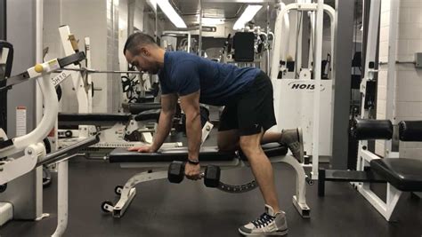How To One Arm Dumbbell Row Correctly Safely Video The White Coat Trainer