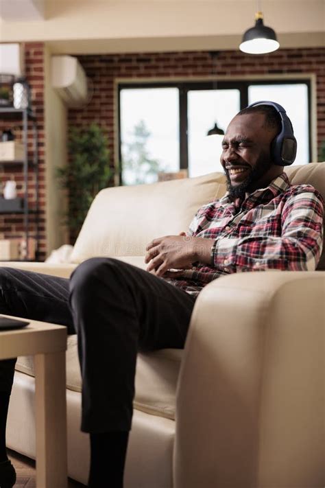 Male Freelancer Working And Listening To Music Stock Image Image Of