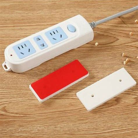 1pcs Self Adhesive Socket Fixer Wall Hanging Power Strip Holder Fixator Plug In Wall Mounted