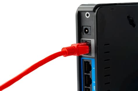 Premium Photo Modern Router With Cables Plugged In Close Up