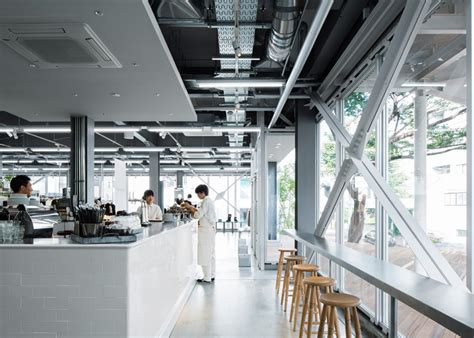 Kengo Kuma Uses A Grand Staircase To Create A Shop