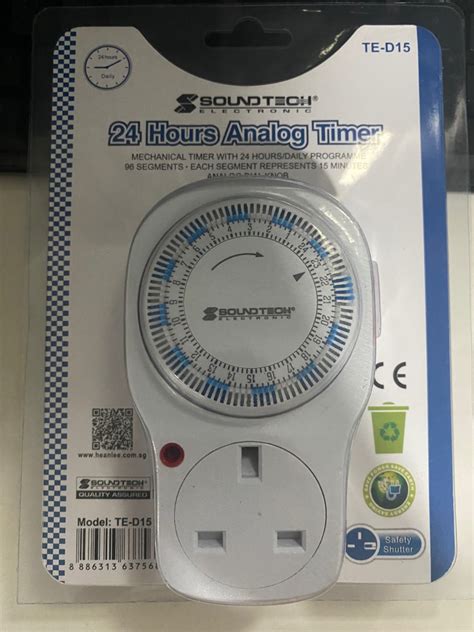 Analog Timer Tv And Home Appliances Electrical Adaptors And Sockets On