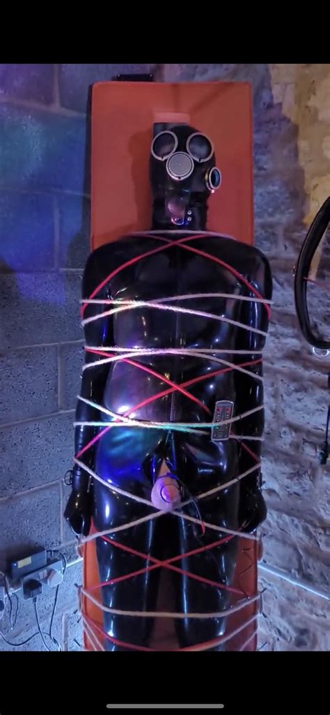 Full Rubber Gimp Tied In Electro