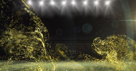 Golden Light Burst In Dimmed Stage With Spotlights Download Free Image From Pikwizard