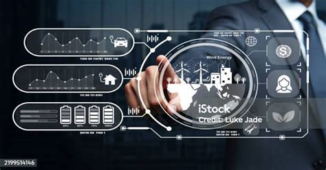 기업 환경에서 풍력 에너지 지표 및 지속 가능성 데이터를 표시하는 미래 지향적인 인터페이스와 상호 작용하는 사업가 개념에 대한 스톡 사진 및 기타 이미지 Istock
