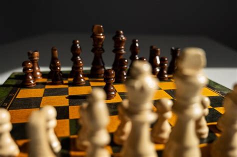 Premium Photo Close Up Of Chess Pieces On Board