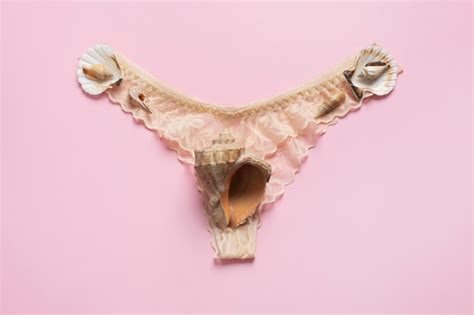 Free Photo Female Reproductive System Concept With Shells