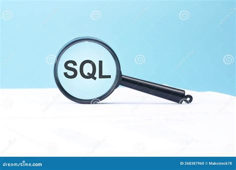 Look At The Text Sql Through A Magnifying Glass On A Blue And White