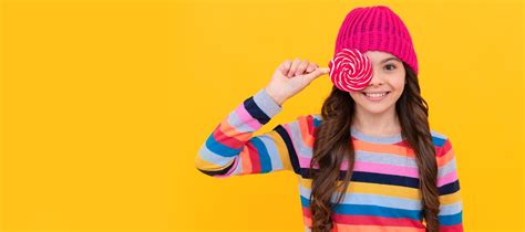 Premium Photo Cheerful Teen Girl With Lollipop Candy Lollypop
