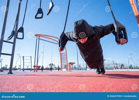 Man Doing Loop Exercises Outdoors Stock Photo Image Of Motivation Male