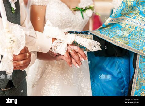 Beautiful Wedding Ceremony With Hands Tied Together In Unity Stock