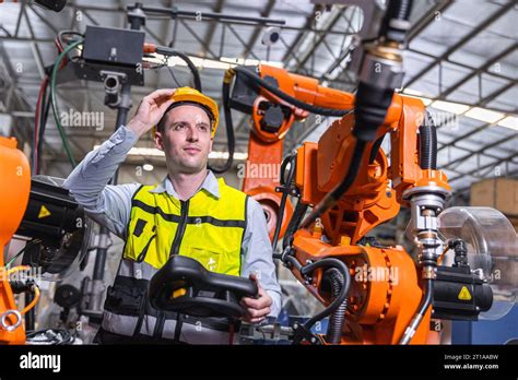 Smart Modern Engineer Male Using Modern Robot Technology Robotic