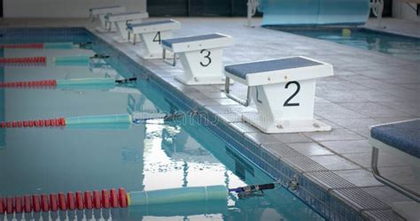 Framing Starting Block 2 Sitting On Deck In Competition Pool Lane