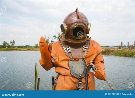 Diver Immerses In A Vintage Deep Sea Diving Suit Stock Image Image Of