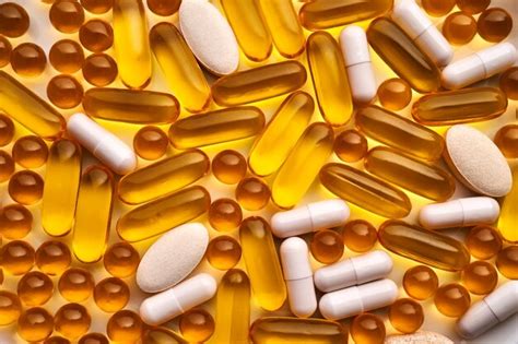 Premium Photo Background Of Tablets Mainly Vitamins And Dietary Supplements