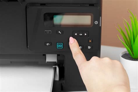 Premium Photo Woman Using The Printer To Scanning And Printing Document