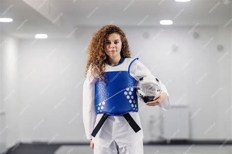 Premium Photo Portrait Of A Taekwondo Girl With Taekwondo Equipment