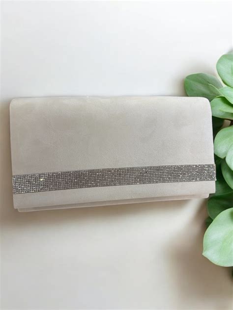 Katie Clutch Cream Off The Rack