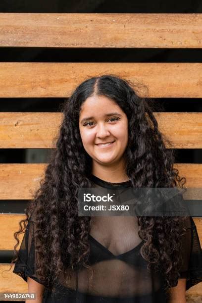 Lesbian Girl Looking At The Camera Confidence State By Her Own Image