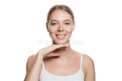 beautiful female face with cute smile skin marked with arrows on the