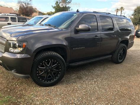 2010 Chevrolet Suburban 1500 With 20x9 0 Pro Comp Series 48 And 305 55r20 Cooper Discoverer X T
