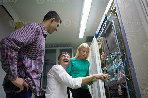 Network Engeneers Working In Network Server Room 31049350 Stock Photo At Vecteezy
