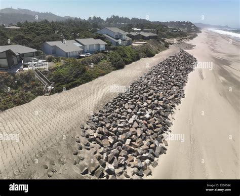 Beach Erosion Mitigationrestoration And Riprap Construction At