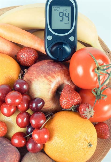 Glucose Meter For Checking Sugar Level And Healthy Fruits With