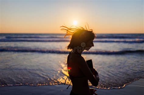 Girl On The Beach Portrait Of A Happy Girl Enjoying Summer Holidays On
