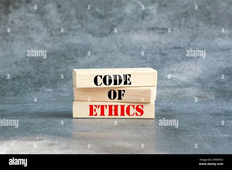 Code Of Ethics Symbol Concept Words Code Of Ethics On Wooden Blocks Beautiful Grey Background