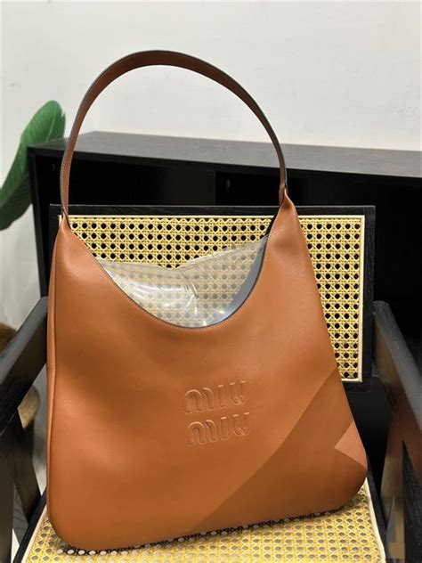 Сумка на плечо Miu Miu купить с доставкой по выгодным ценам в