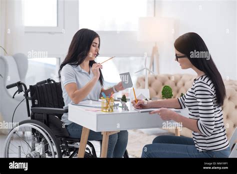 Earnest Female Engineers Conducting Measurement Stock Photo Alamy