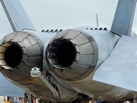 Fa 18f Super Hornet Flies Over Nimitz Class Aircraft Carrier Uss