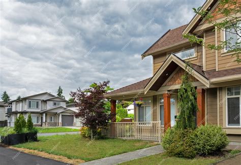 Premium Photo Street View In Suburban Residential Area On Cloudy Sky