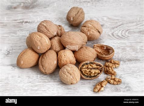 Walnuts Whole In Their Skins Chopped Nut Hulls Walnut Kernels Stock