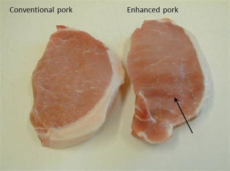 Surface Discoloration In Moisture Enhanced Pork Chops Arrow Pointed At