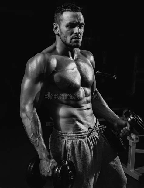 Dumbbells Sportsman In Gym Sporty Exercises Male Torso With Six