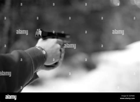 Man Hand Pointing Gun Black And White Stock Photos Images Alamy