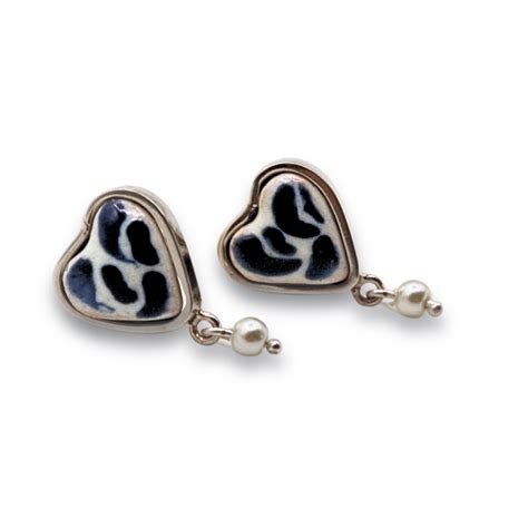 Aretes Amorcito Plumeado Trimori