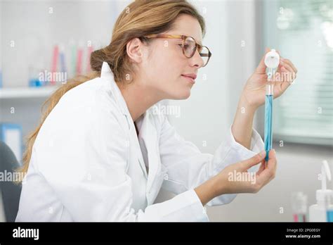 Female Researcher Is Using The Pipette To Transfer Liquids Stock Photo Alamy