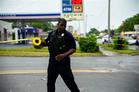 Police investigate shooting on the corner of Saginaw and Leith Streets ...