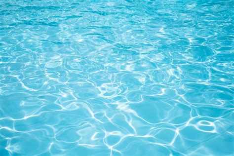 Blue Water Surface In Swimming Pool For Blue Abstract Or Background