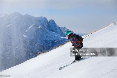 Woman Skier Skiing At Ski Resort Amateur Winter Sports High Res Stock