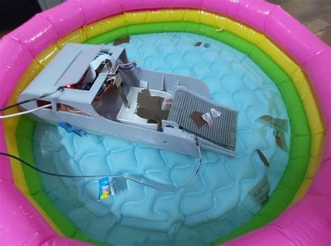 design and development of garbage collecting boat using raspberry pi